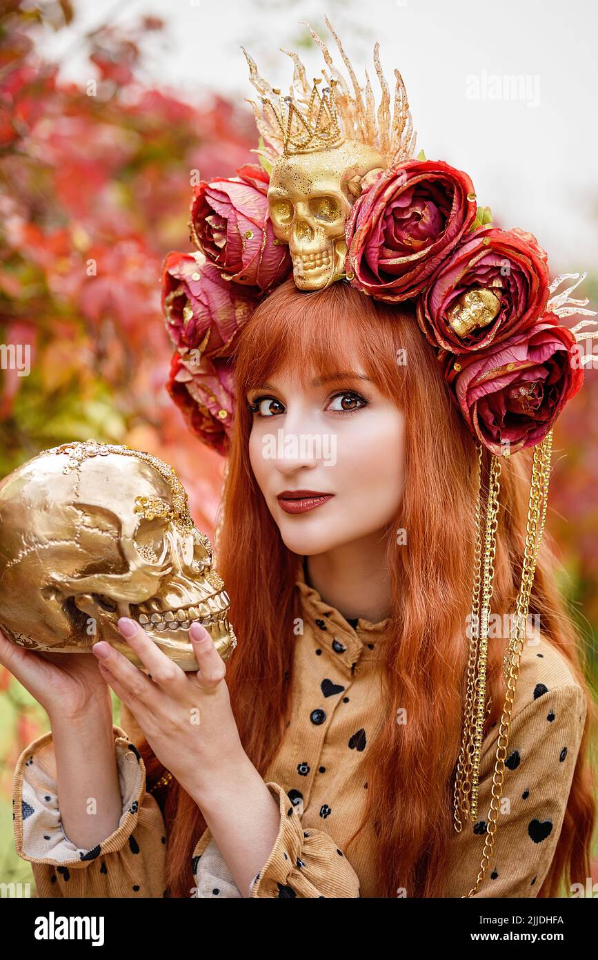 Closeup portrait of Calavera Catrina in red dress. Dia de los muertos ...