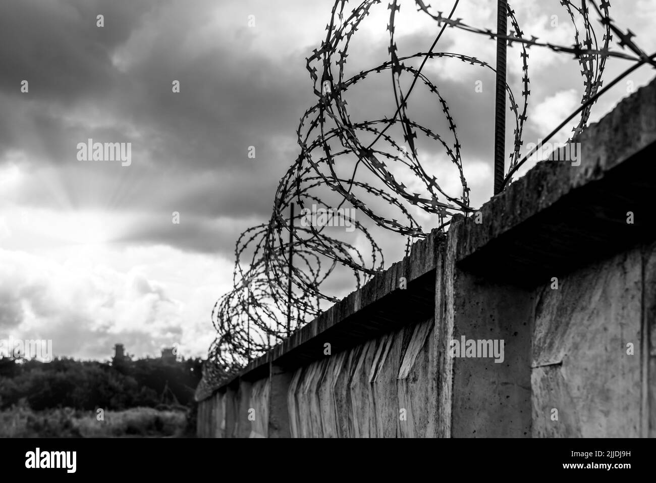 Wire security fence and gate Black and White Stock Photos & Images - Alamy