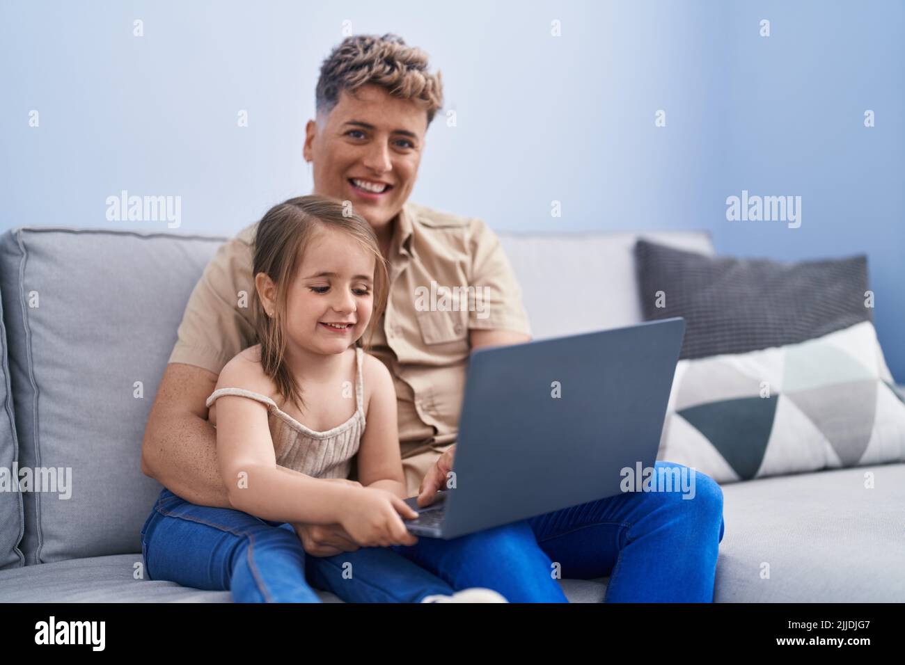 Father and daughter father and daughter using laptop at home Stock ...