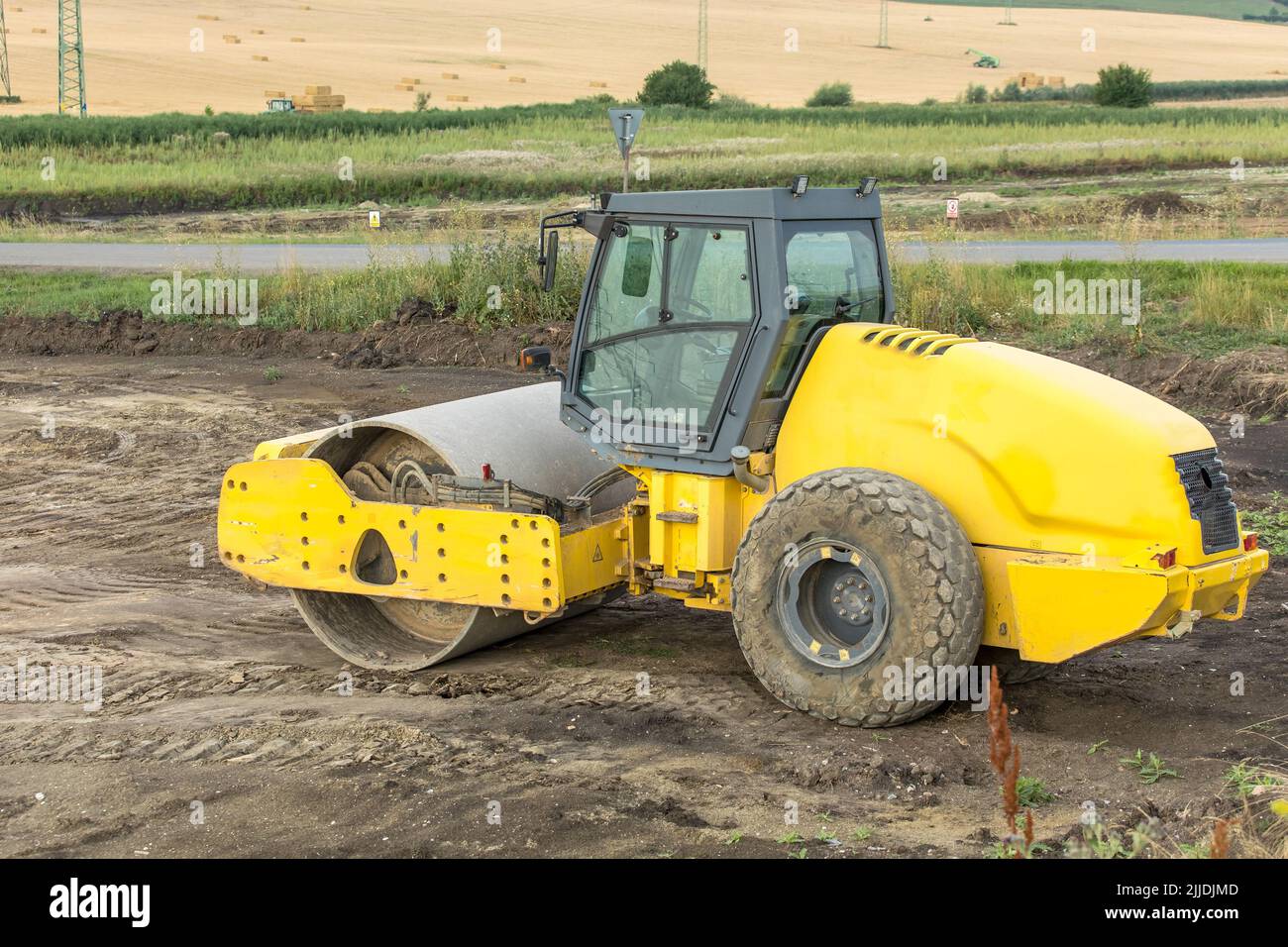 Heavy Vibration roller at compaction pavement works during road ...