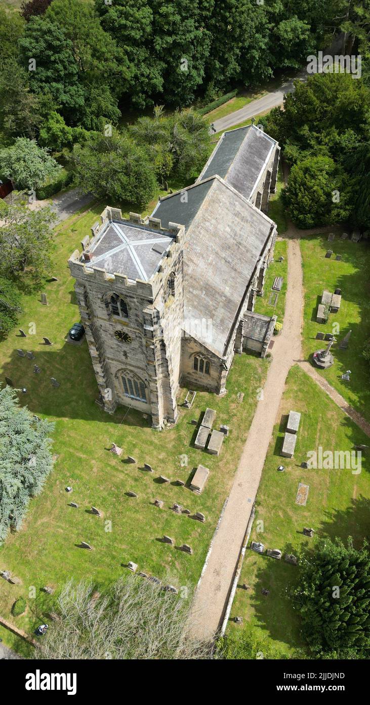 An aerial view of St. Andrews Church in Bainton, Yorkshire England ...