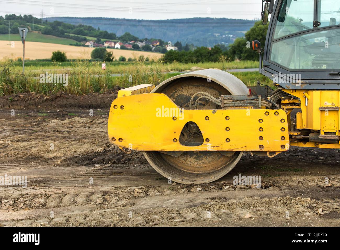 Heavy Vibration roller at compaction pavement works during road ...