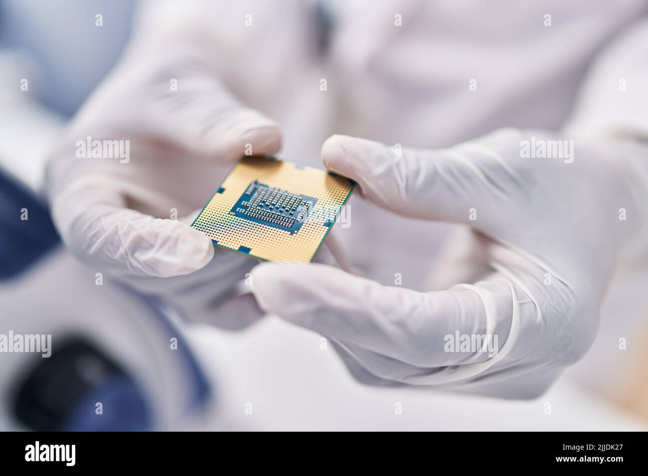 African american woman wearing scientist uniform holding cpu microchip ...