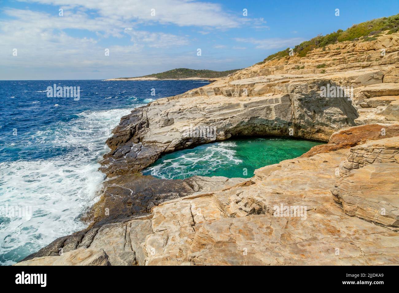 Natural rock lagoon Giola on the island of Thassos, Greece Stock Photo ...