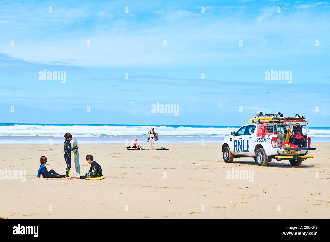 RNLI patrol car on the shore as surfing is cancelled due to treacherous ...