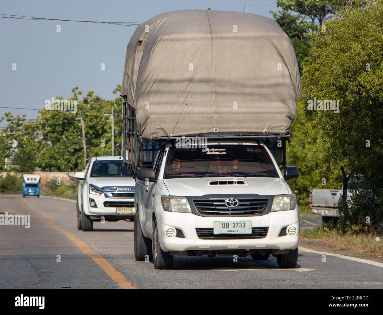 BANGKOK, THAILAND, APR 29 2022, A full loaded pick up car drives on the ...