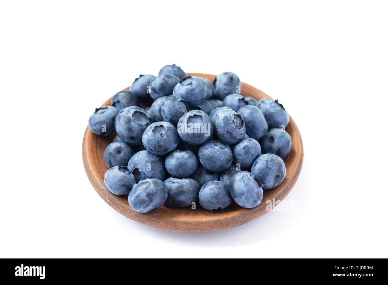Brown ceramic bowl of fresh ripe blueberries isolated on white ...