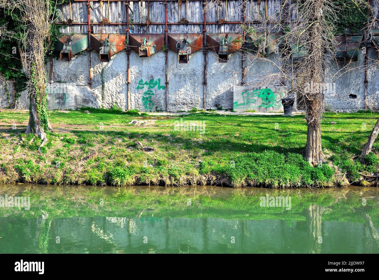Padua, Veneto, Italy. Bacchiglione river. The bulkheads and the hoppers ...