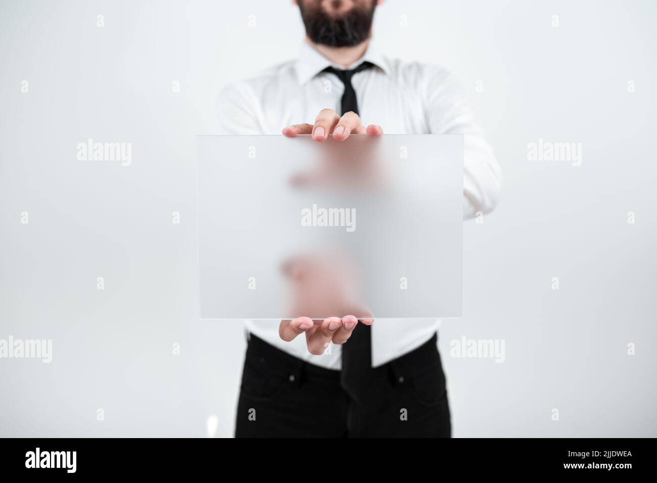 Man Holding Placard Presenting Marketing Strategies For Development ...