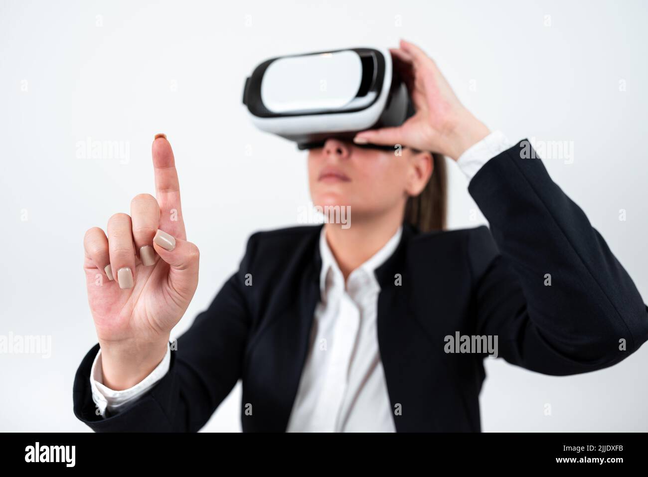 Woman Wearing Vr Glasses And Pointing On Important Message With One ...