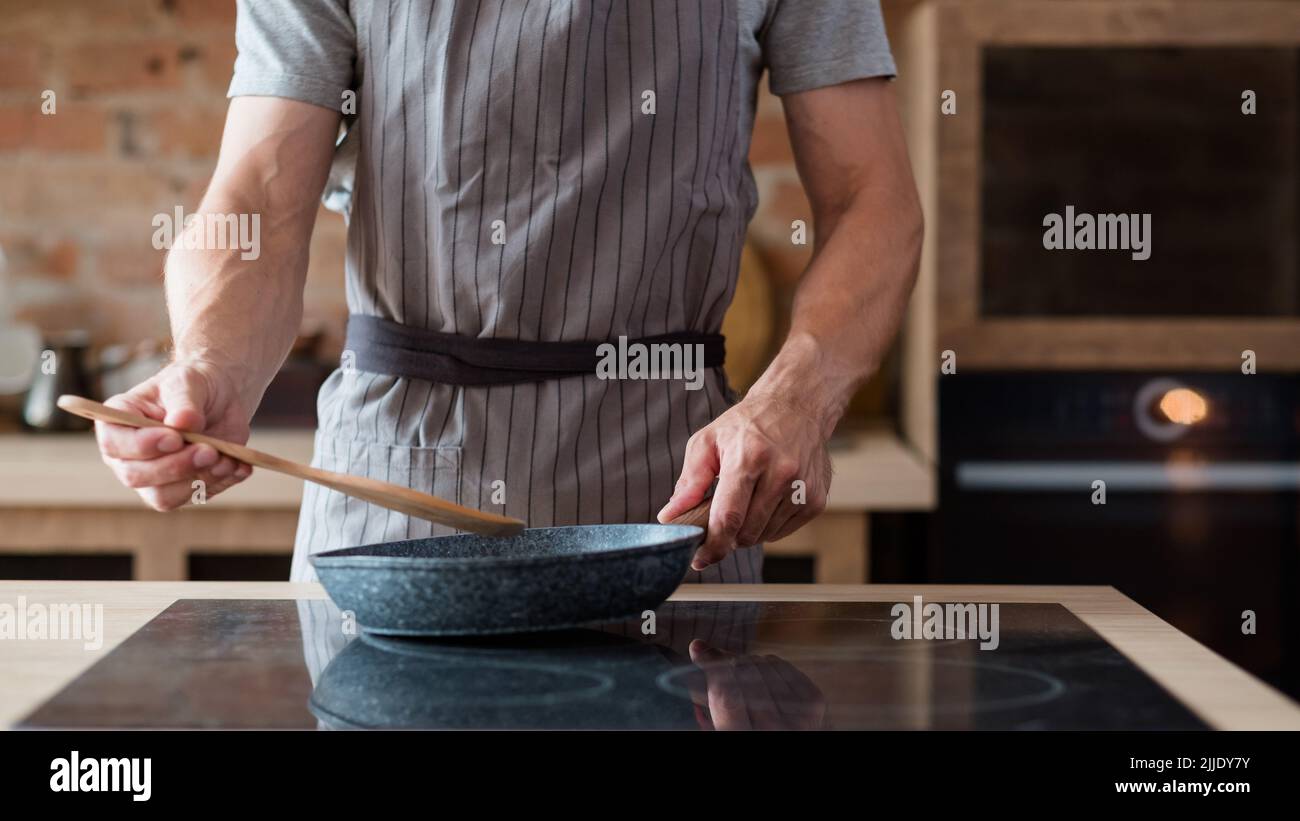 breakfast food recipe cook meal man frying pan Stock Photo - Alamy
