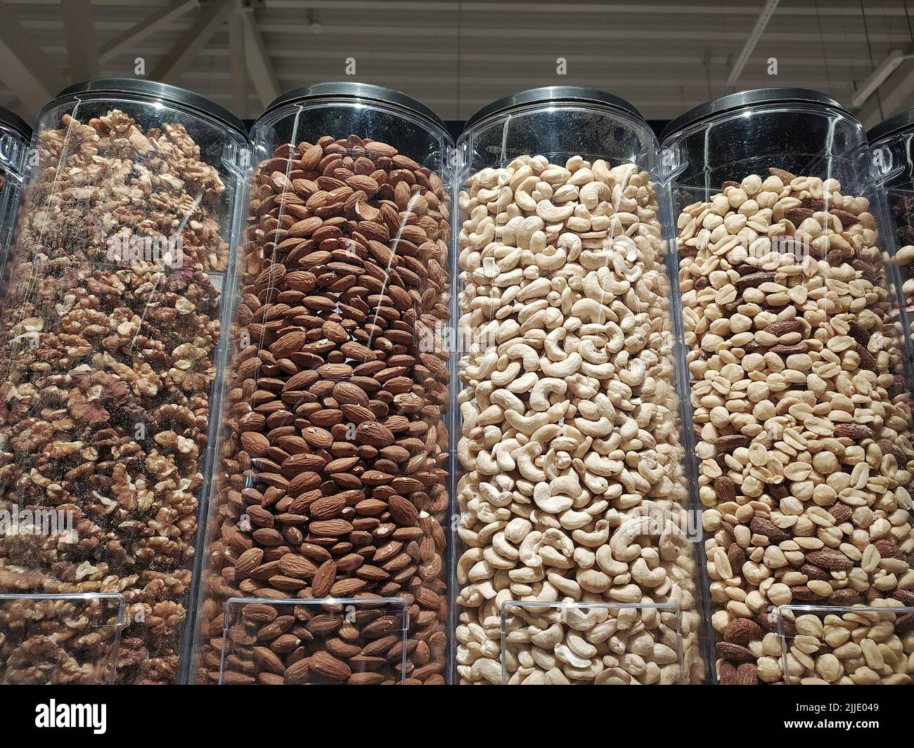 Nuts in the Riga supermarket. Different types of nuts Stock Photo - Alamy