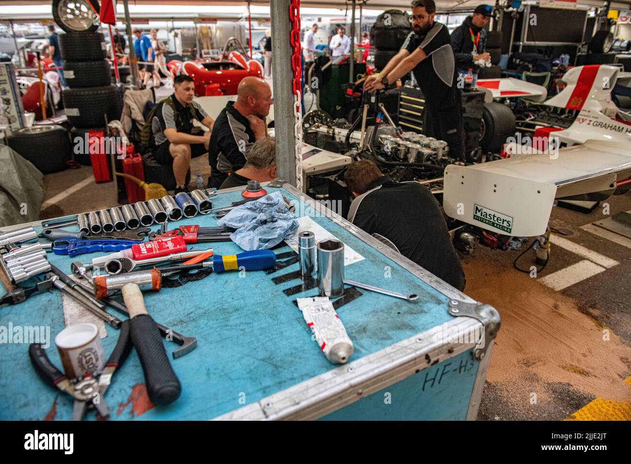 Embassy Hill car driven by Graham Hill in the pits of the historic ...