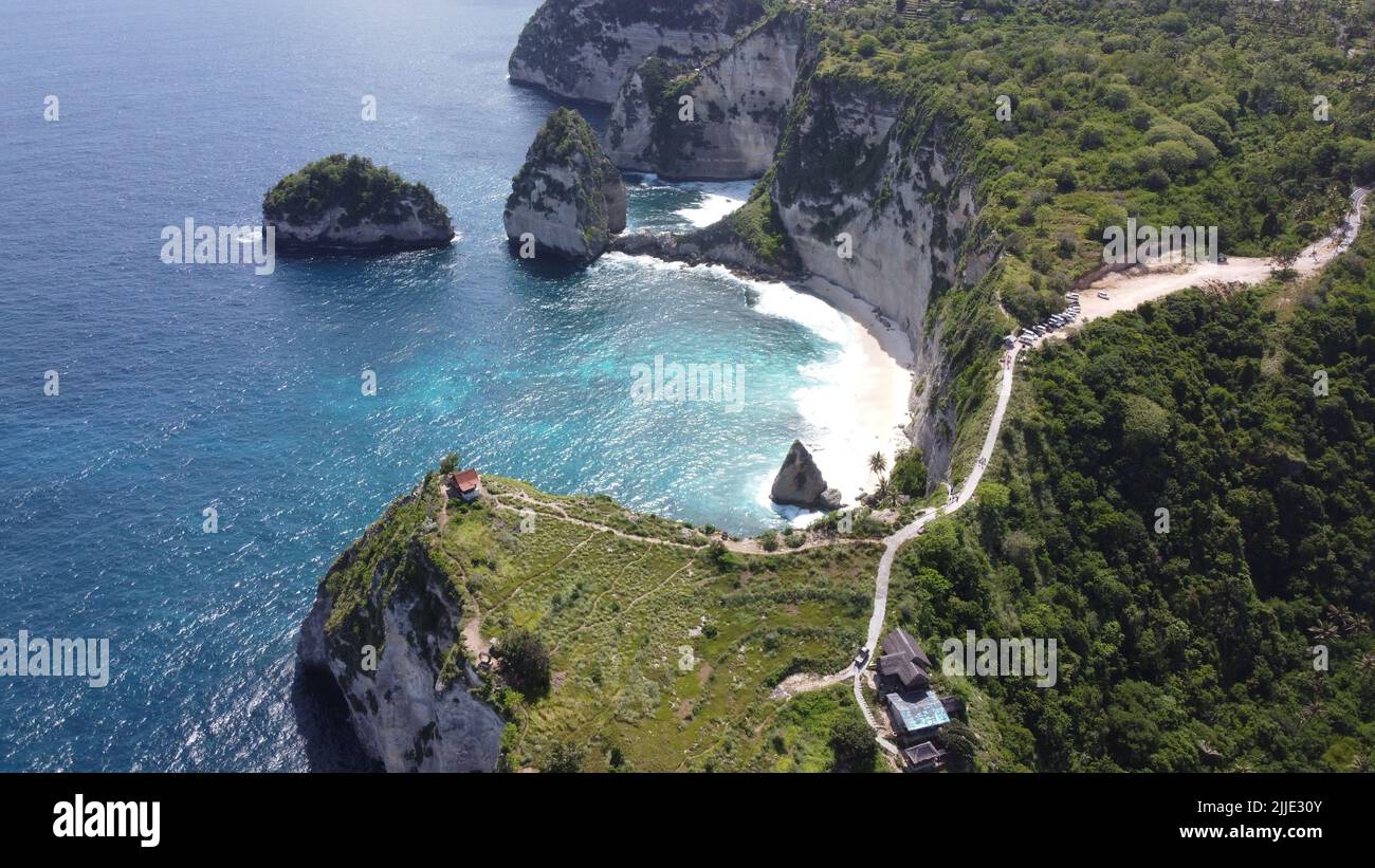 An aerial view of ocean waves hitting a huge cliff Stock Photo - Alamy