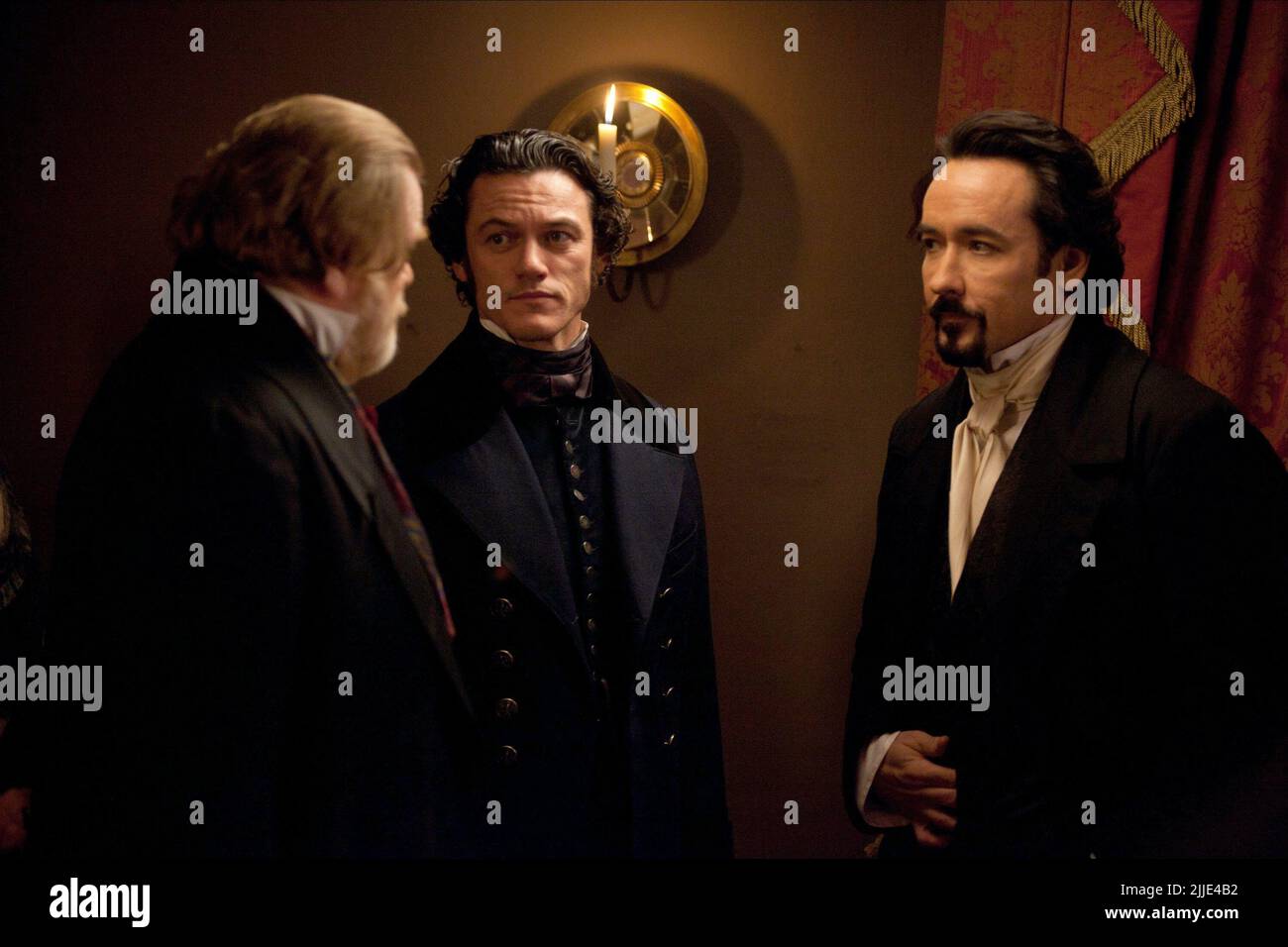 LUKE EVANS, JOHN CUSACK, THE RAVEN, 2012 Stock Photo - Alamy