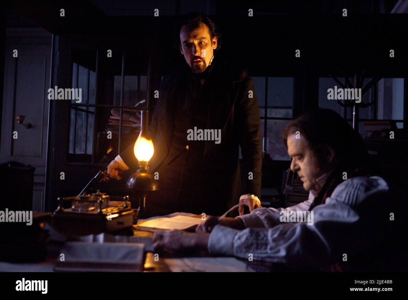 JOHN CUSACK, KEVIN MCNALLY, THE RAVEN, 2012 Stock Photo - Alamy
