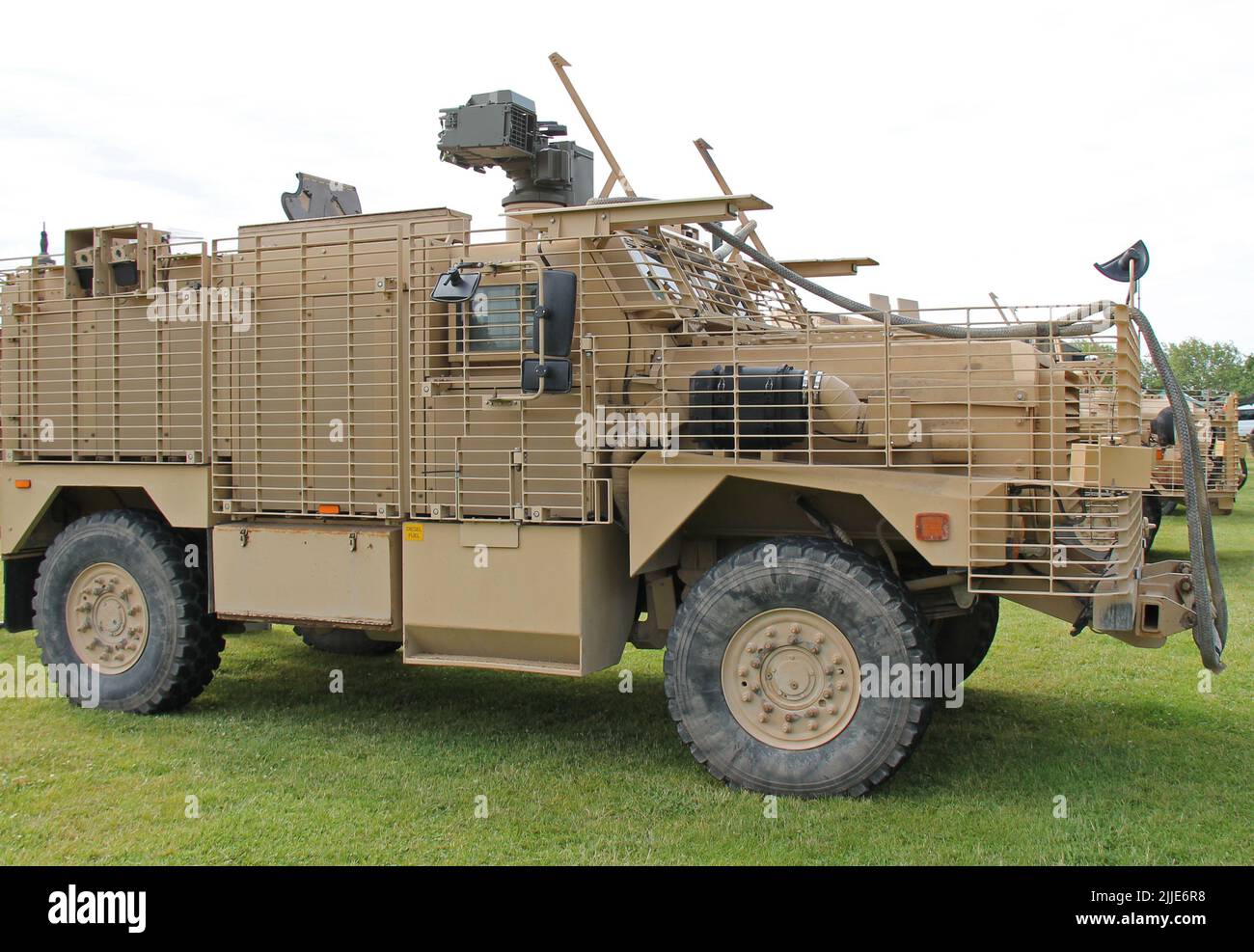 A Khaki Coloured Military Armoured Heavy Vehicle Stock Photo - Alamy