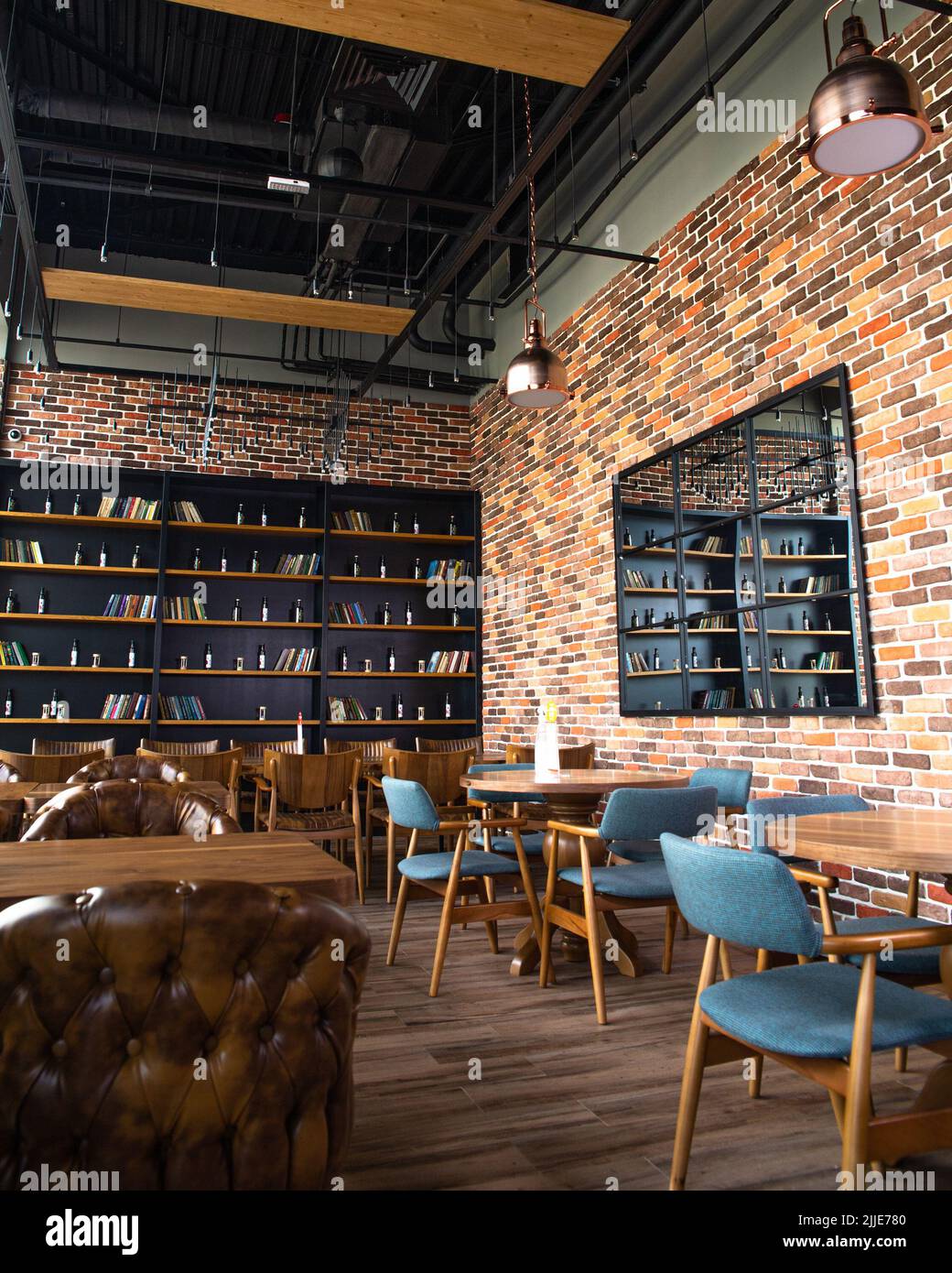 brick interior of the restaurant in the daytime Stock Photo - Alamy