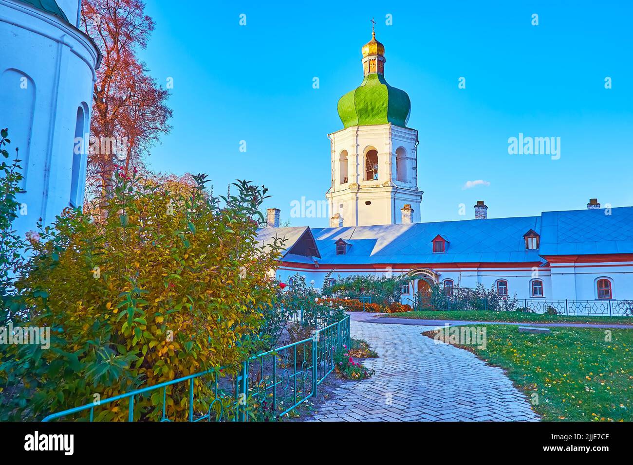 The scenic garden with flower beds and green lawn on the grounds of ...
