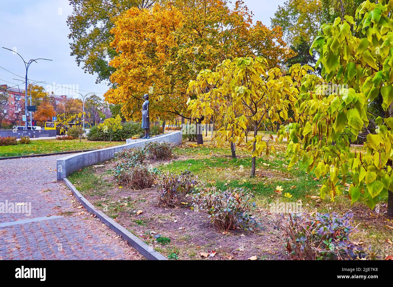 The alley in autumn Babyn Yar Holocaust Memorial Park with a view on ...
