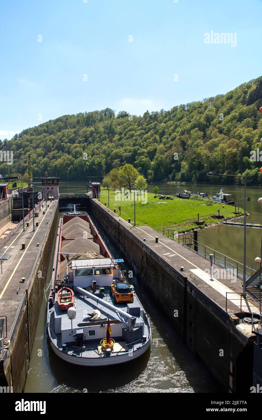 A vertical shot of a cargo ship in a lock on the Neckar river Stock ...