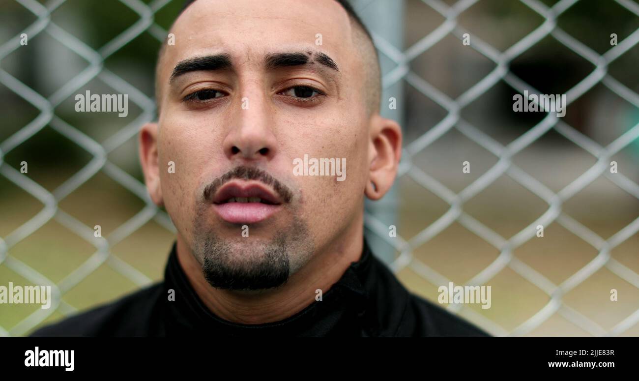 Hispanic man walking forward, south american latin guy serious face ...