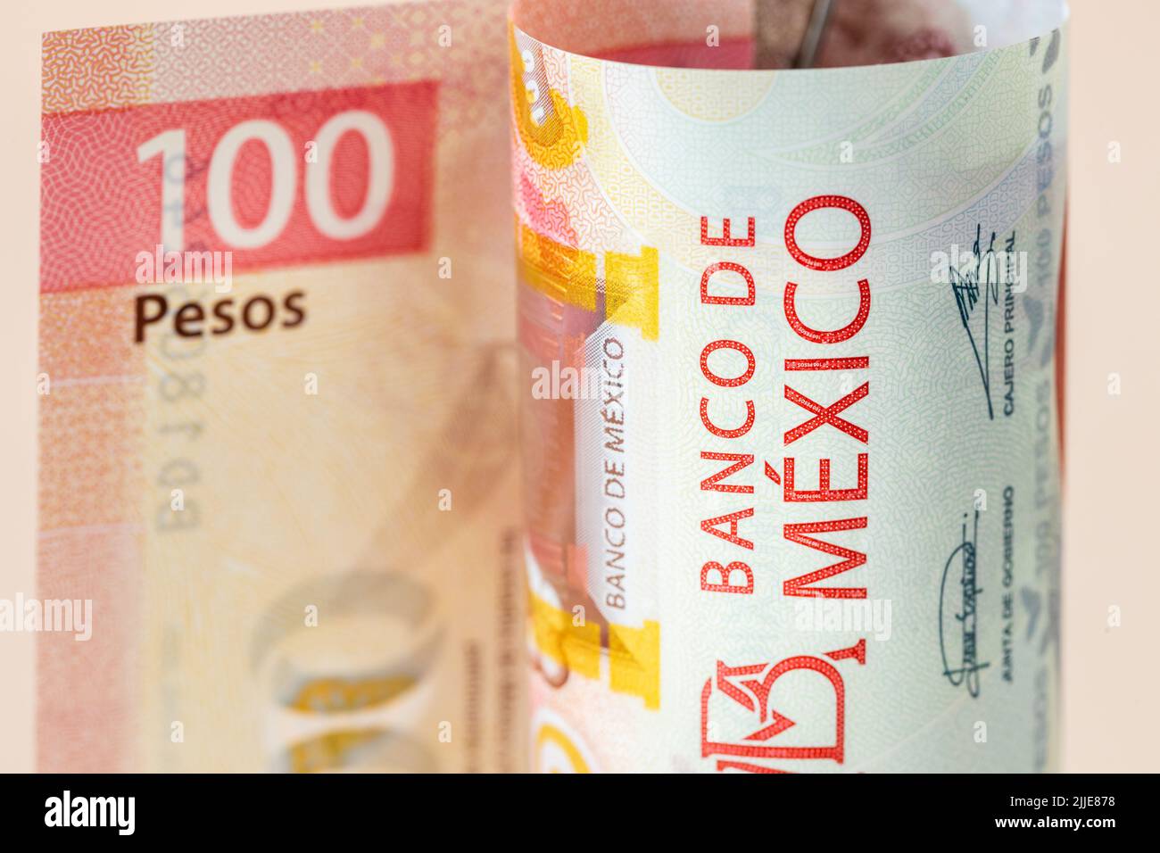 Mexico money, Rolled up 100 pesos banknote, Economic and business ...