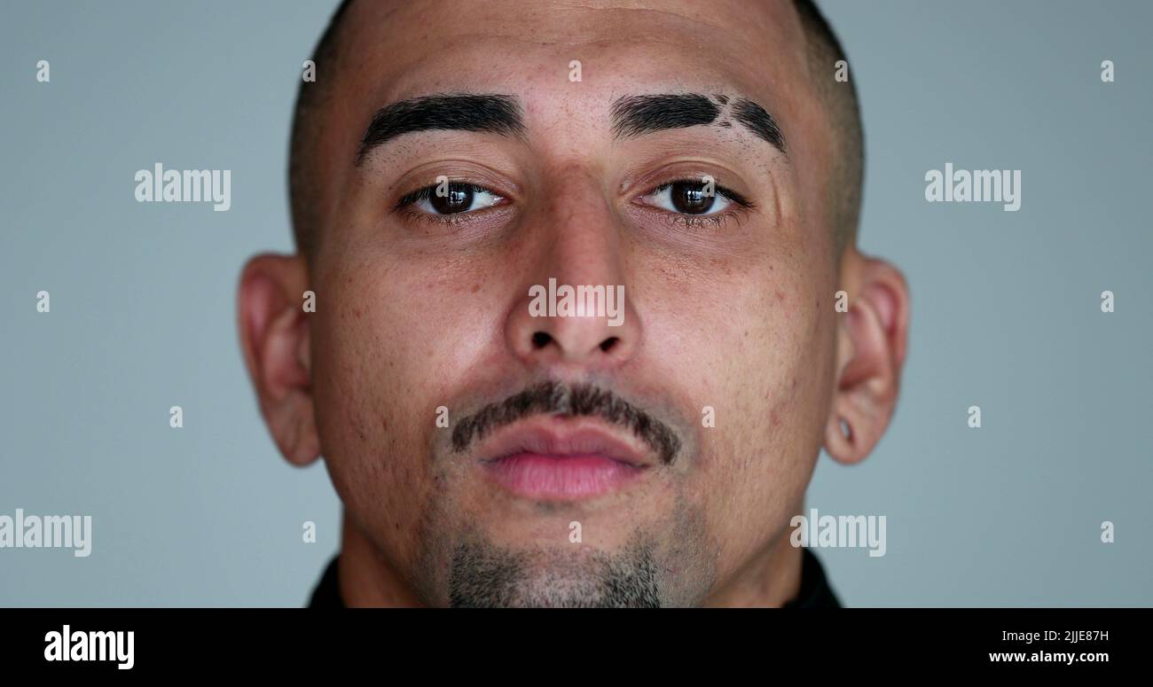 Hispanic young man portrait looking at camera. Latino south american ...