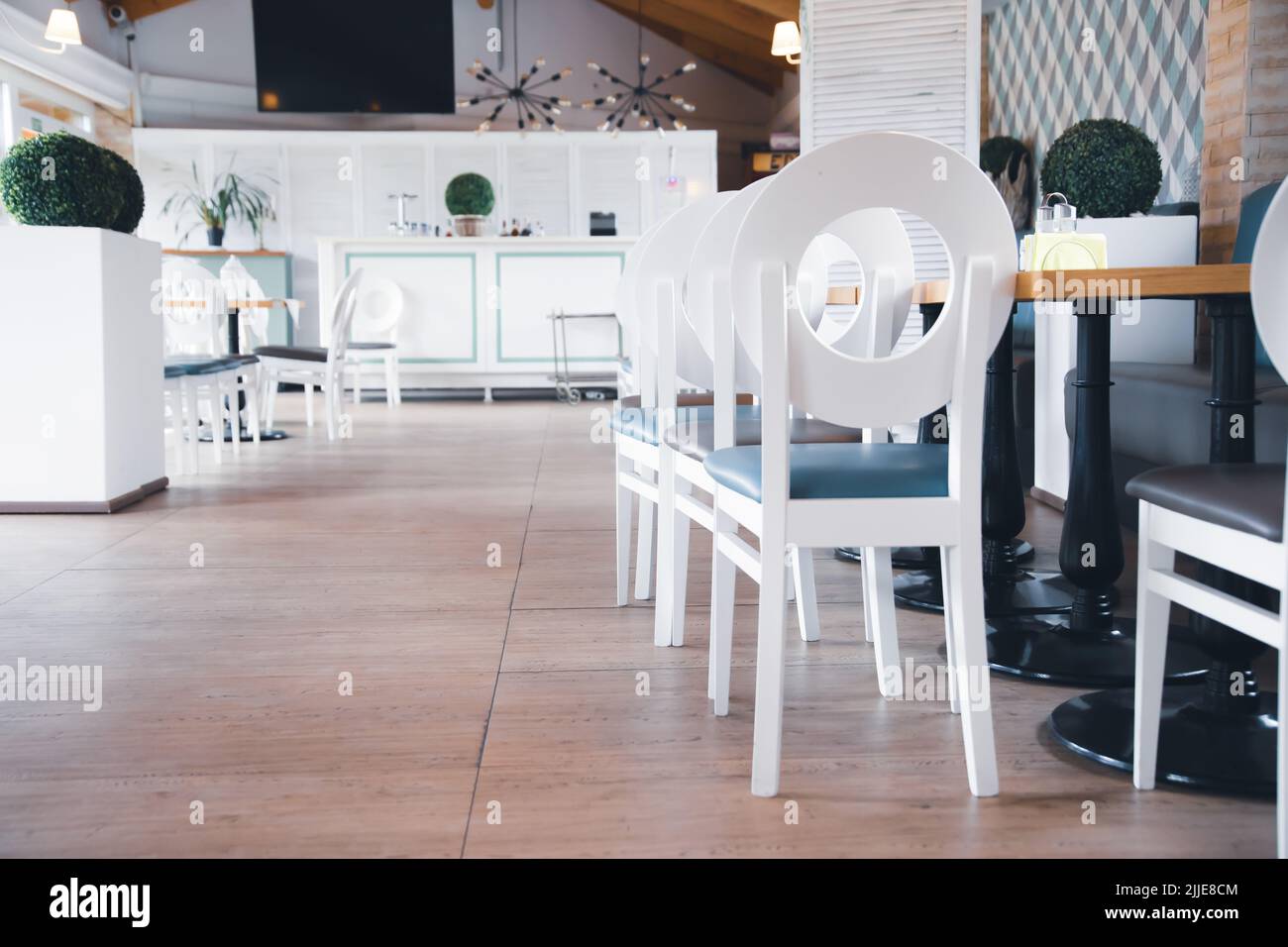 Empty hall of a cozy, modern restaurant Stock Photo - Alamy