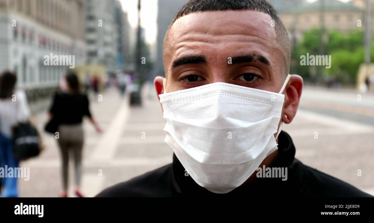 Man taking off covid-19 face mask feeling relief and satisfaction Stock ...