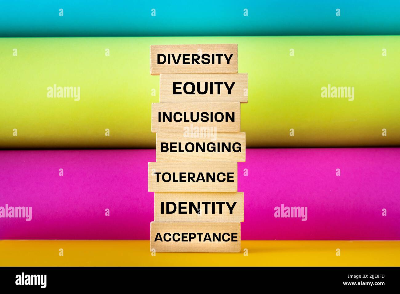 words written on a wooden block, Diversity equity inclusion belonging ...