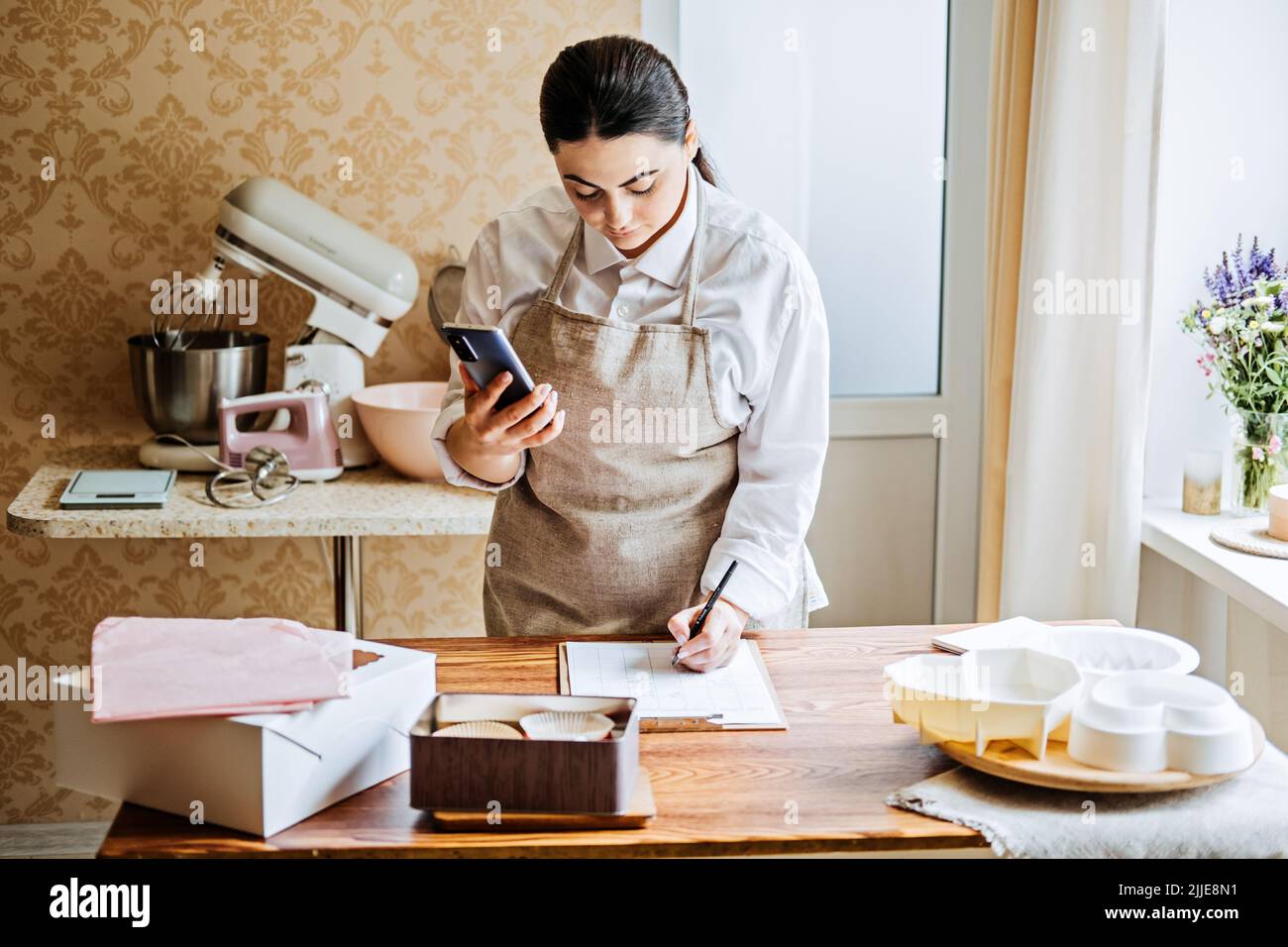 Small local business owner of confectionery, sweet-shop, pastry-shop ...