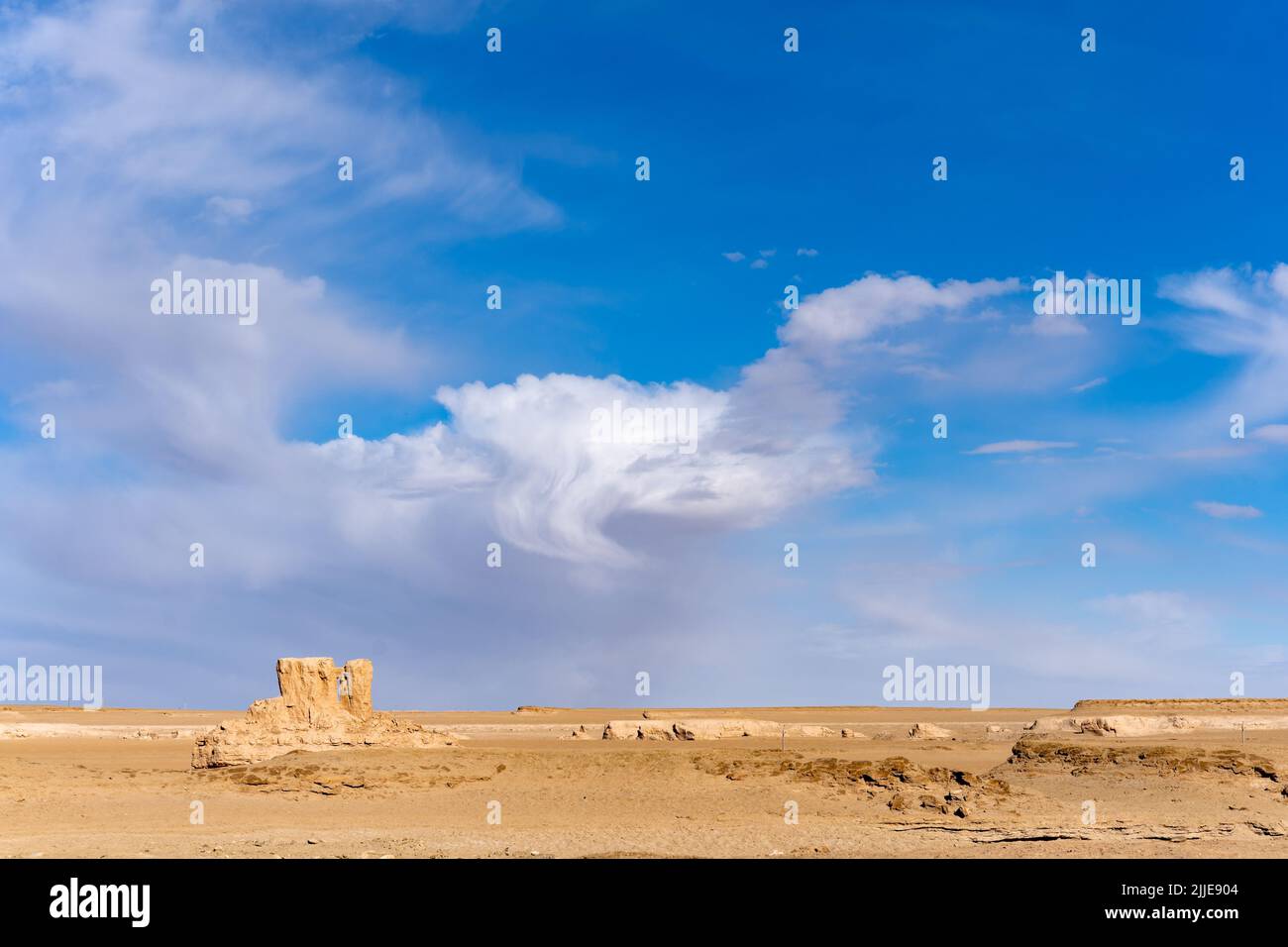 A dry desert during daytime under a blue sky with clouds - great for ...