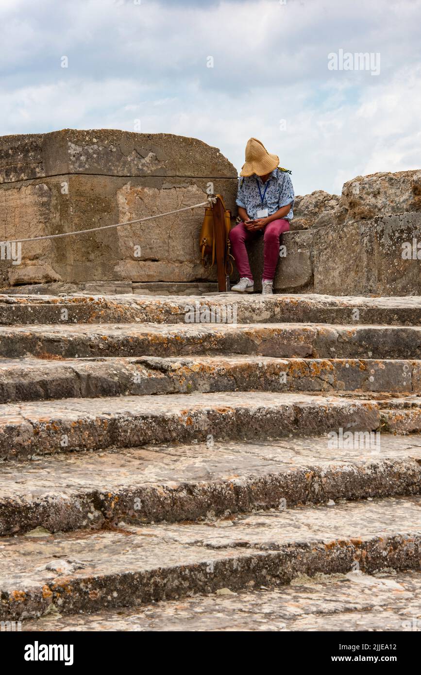 visitors to the ancient greek minoan site of the old temple at knossos ...