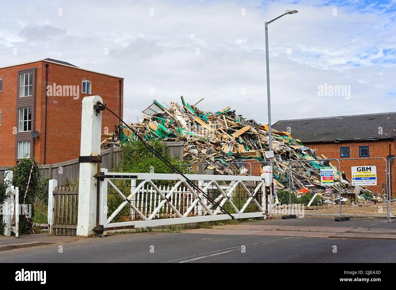 Pile of rubble left after demolition of an apartment block because of a ...
