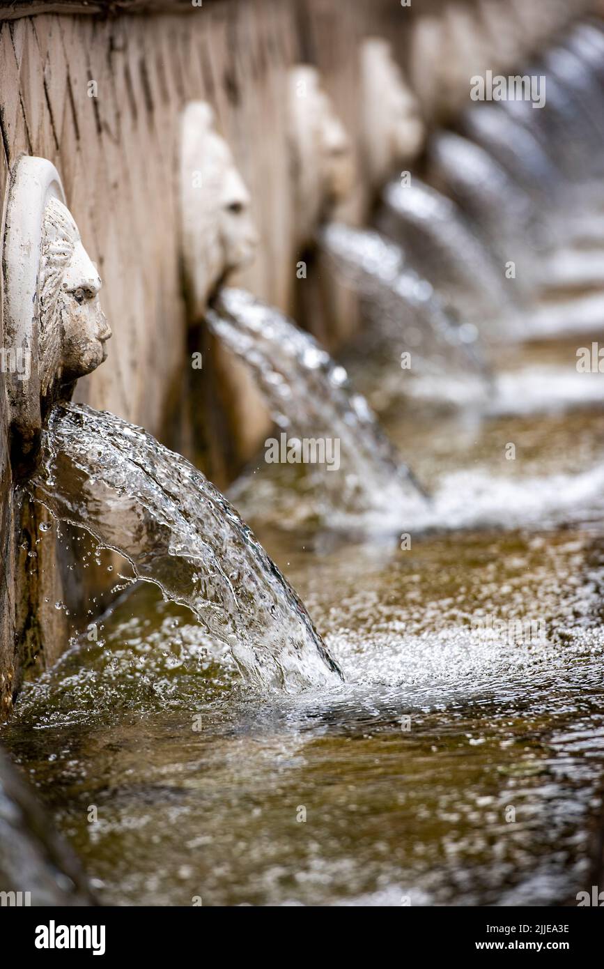 lion mask waterspouts and fountains in a formal garden on the isle of ...