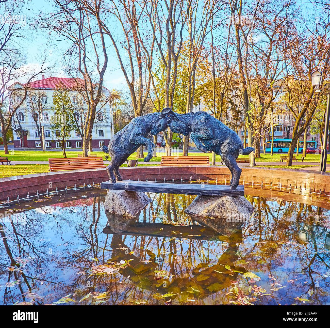 The scenic fountain with sculpture of goatlings in autumn park of ...
