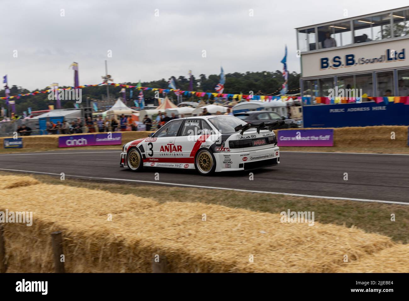 Cars on the track at CarFest Stock Photo - Alamy