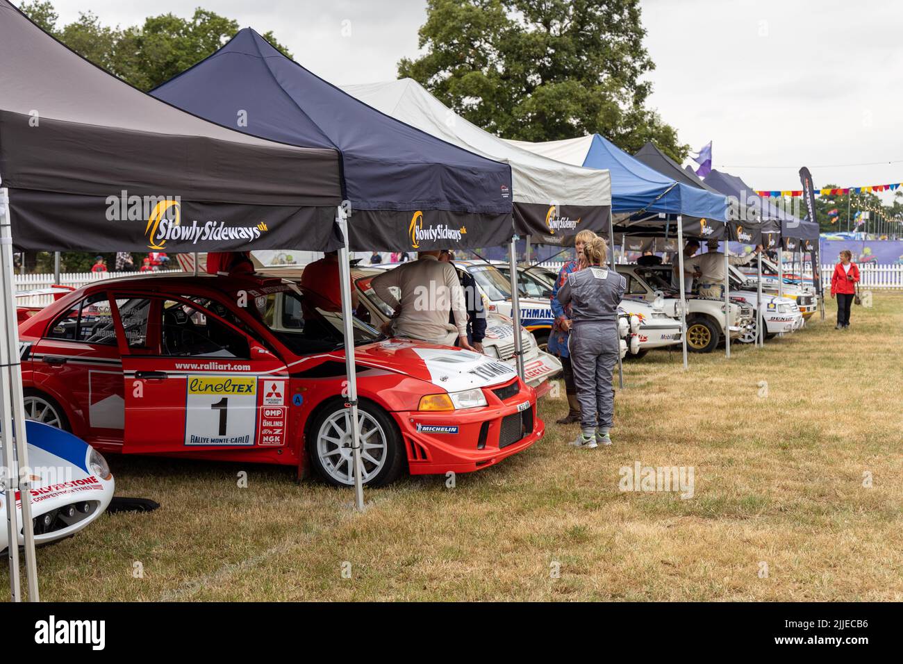 Race cars in paddock at Carfest Stock Photo - Alamy