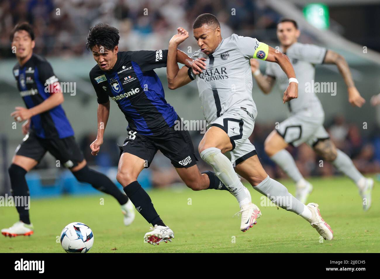 Osaka, Japan. 25th July, 2022. (L-R) Ryu Takao (Gamba), Kylian Mbappe ...