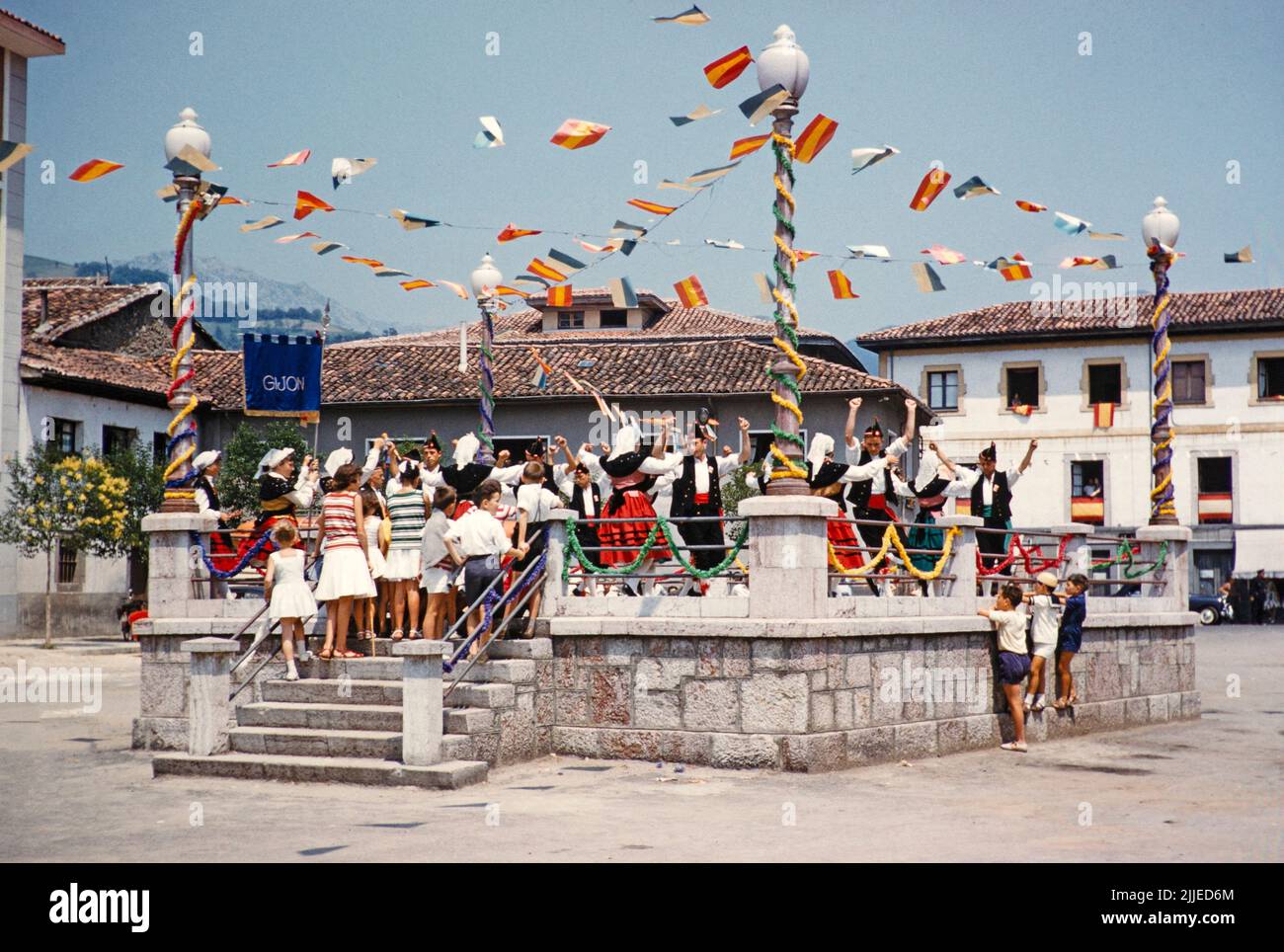 Traditional Asturian folk dancing group from Gijon perfomr in village ...