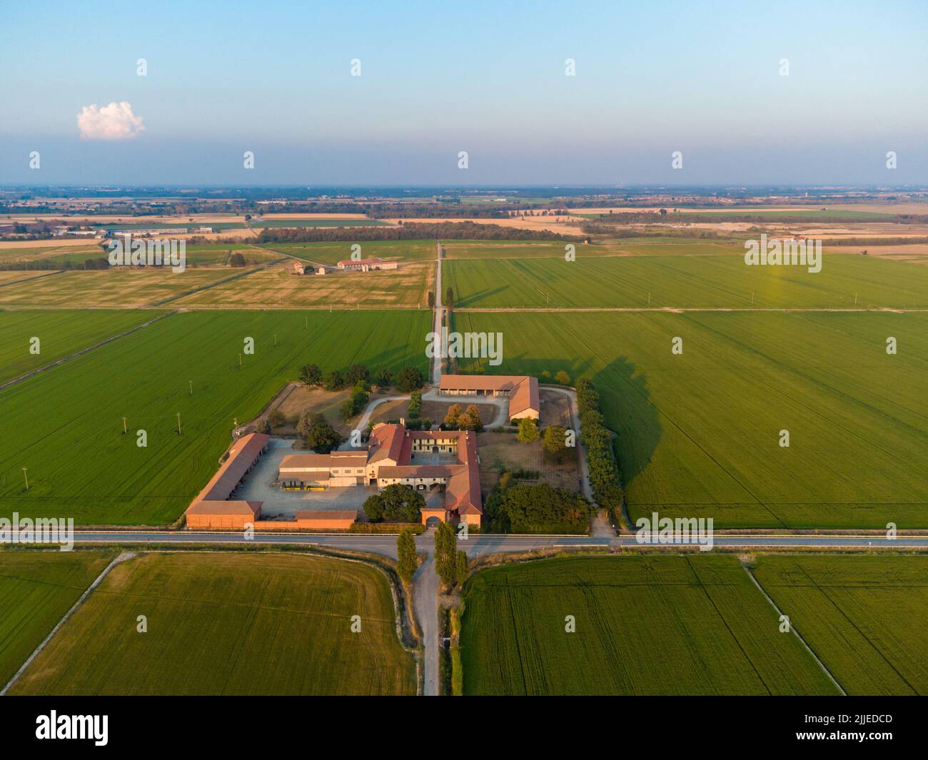 Aerial countryside landscape in Italy with rice fields and an old rural ...
