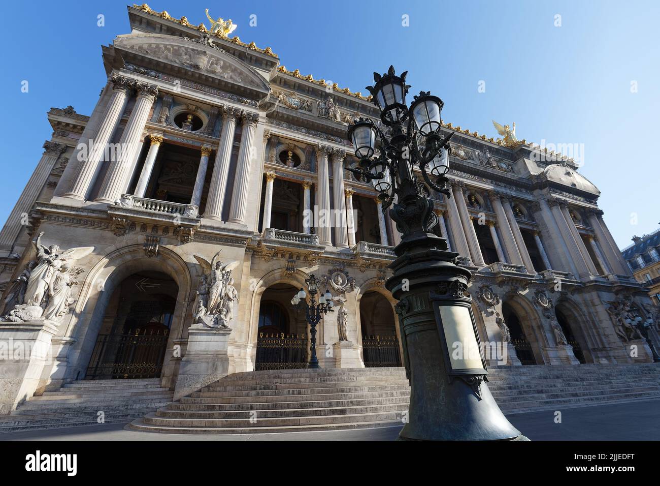 Front view of the Opera National de Paris. Grand Opera is famous neo ...