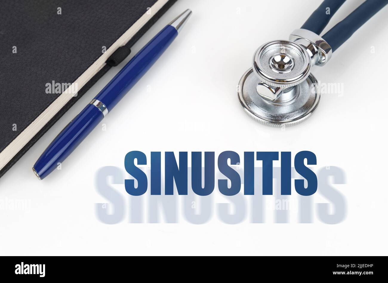 Medicine concept. On a white background, a notepad and a stethoscope ...