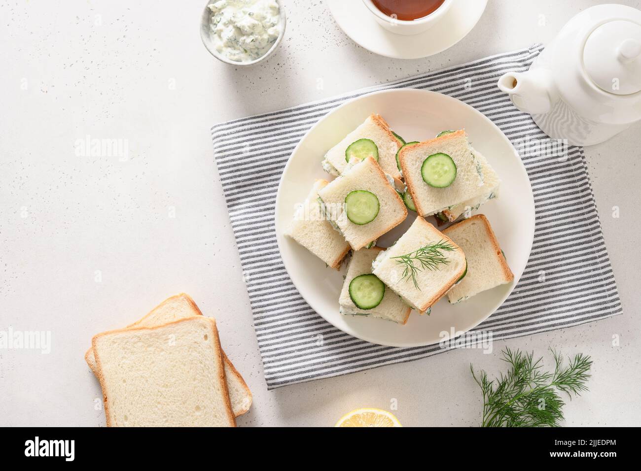 Homemade English tea cucumber sandwiches with ricotta and dill Stock ...