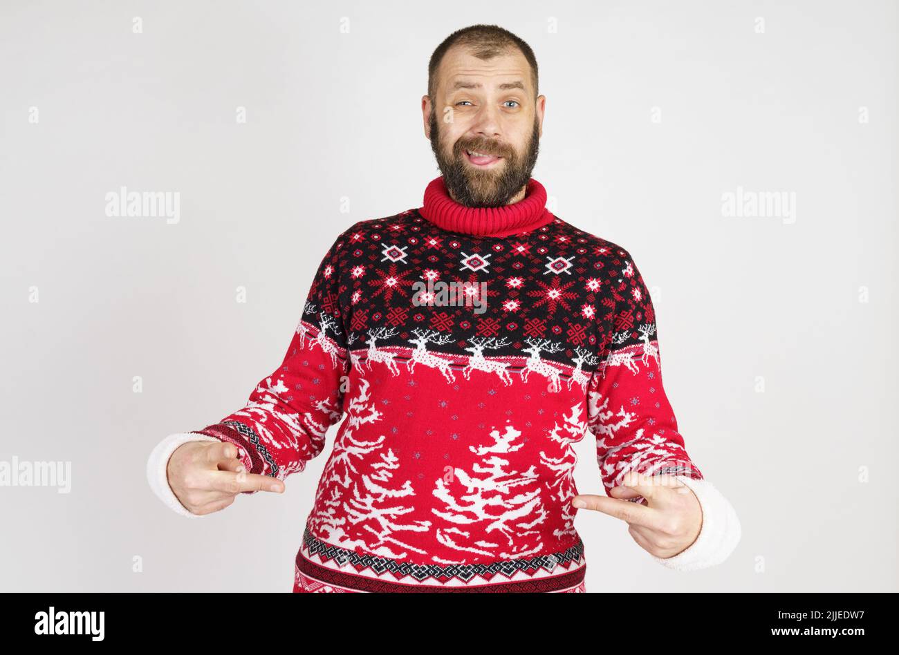 New Year and Christmas concept. Santa Claus shows with gestures to ...