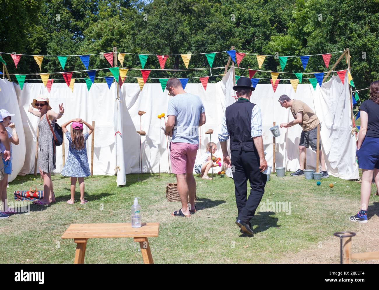 British Summer Nostalgia - Fun times at a retro Coconut Shy Stall while ...