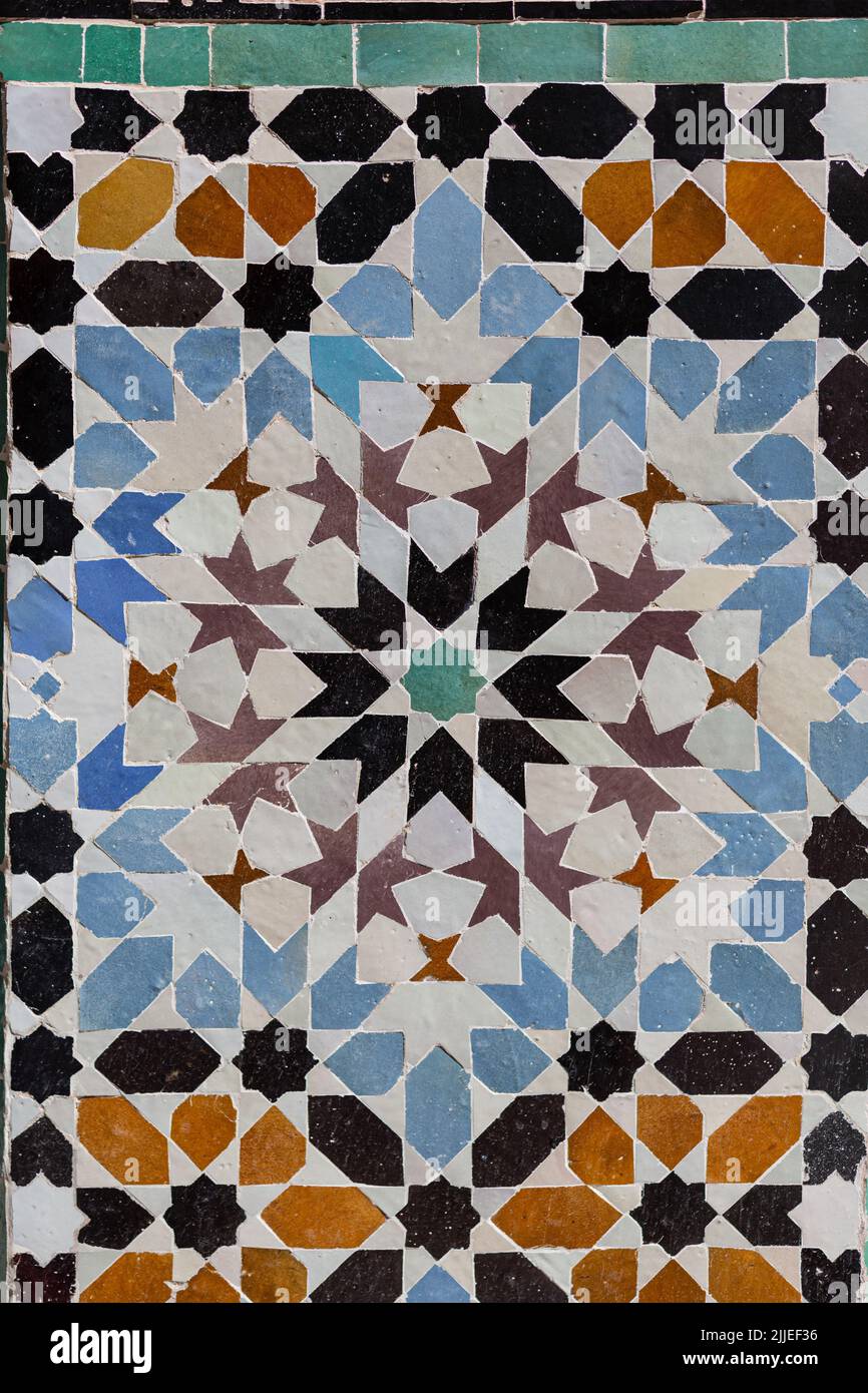 Ancient Arabian tile pattern on a wall with star shape close up detail ...