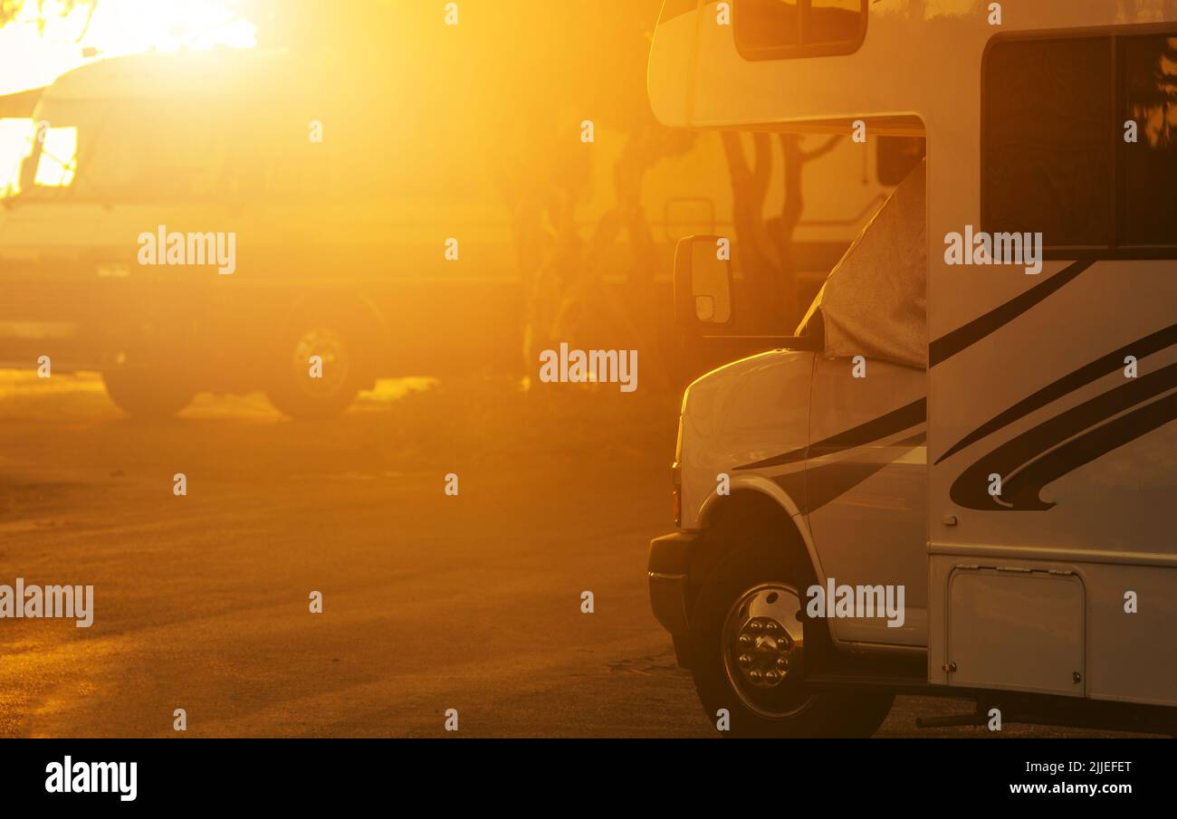 Motorhomes Inside RV Park During Scenic Sunset. Camping Pitches Stock ...