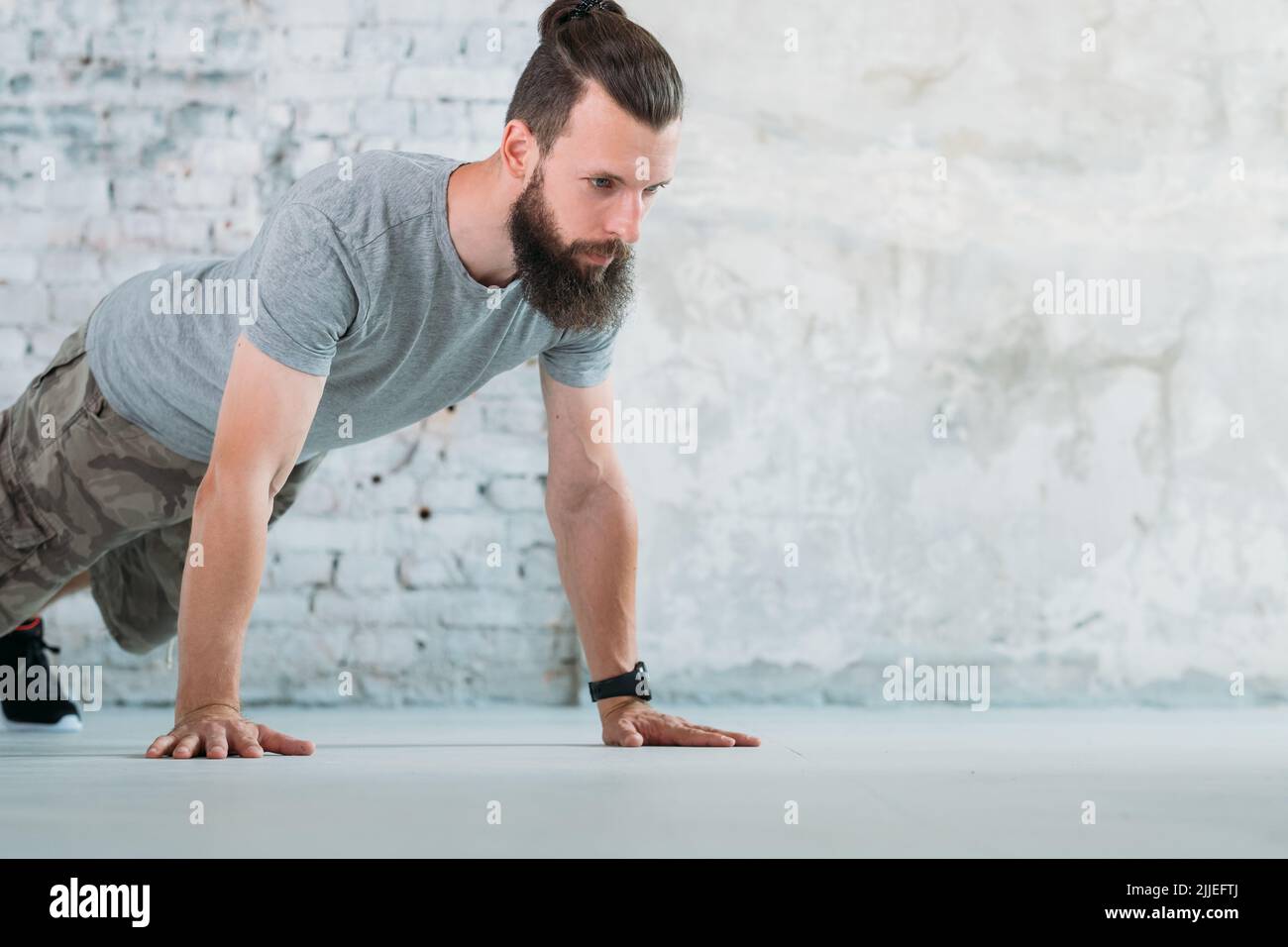 sport fitness training man push ups chest muscles Stock Photo - Alamy